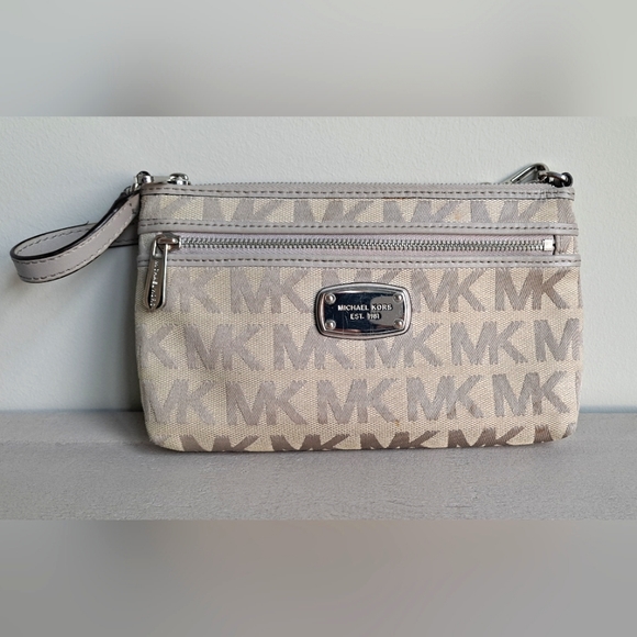 Michael Kors | Bags | Michael Kors Silver Wristlet | Poshmark